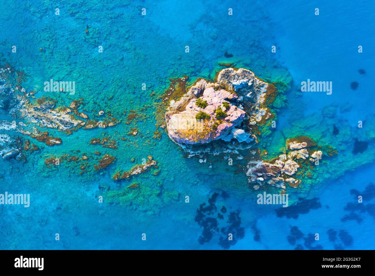 Island and Shallow water in Blue Ocean. Sharp cliff from stone. Rocky ...