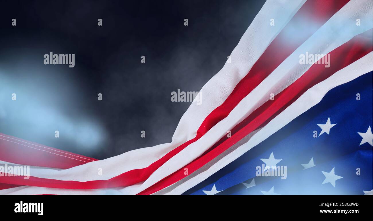 Composition of billowing american flag with white smoke on dark ...