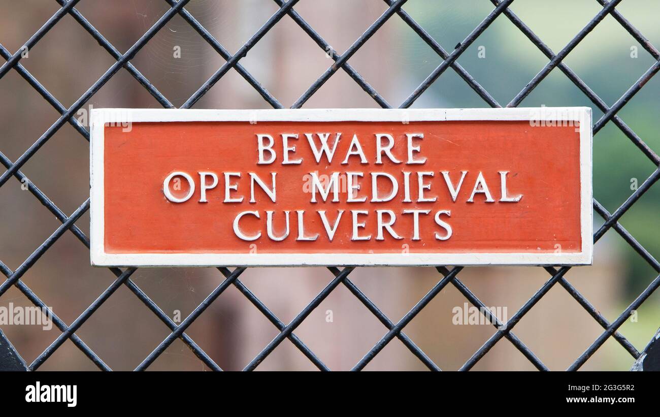 Beware of open medieval culverts Stock Photo - Alamy
