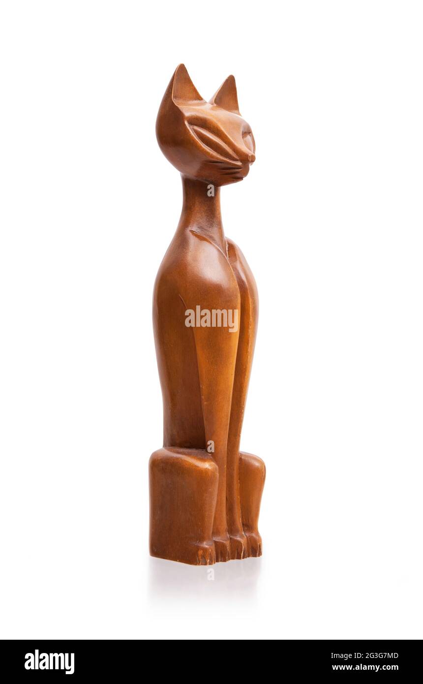 Old wooden statue of a cat Stock Photo - Alamy