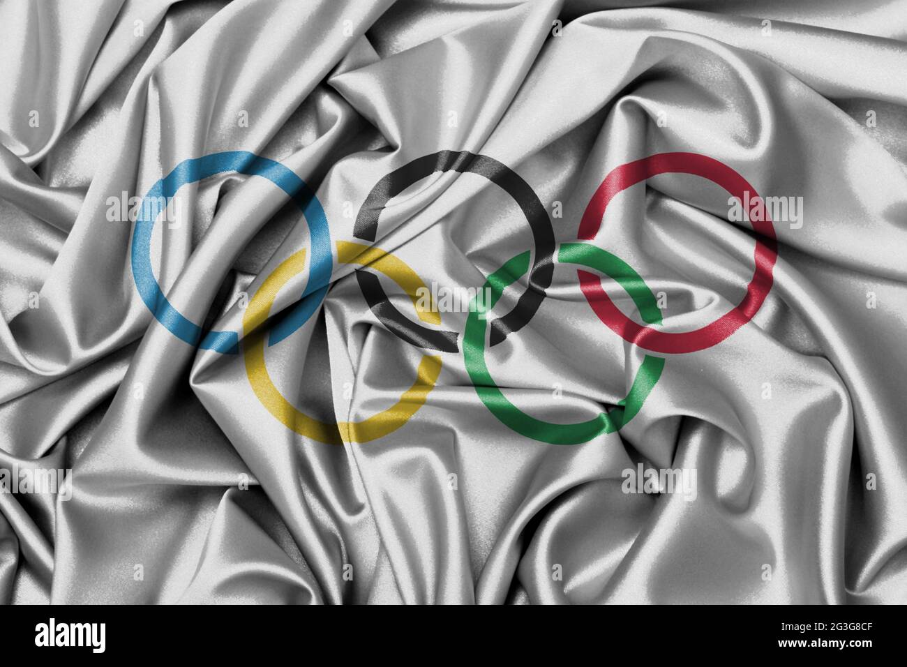 Satin flag with emblem Stock Photo - Alamy