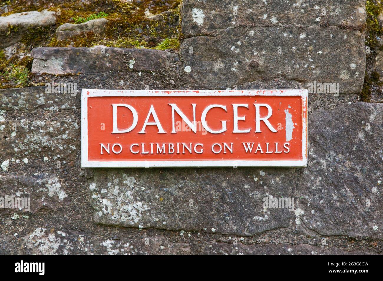 Danger sign on castle wall hi-res stock photography and images - Alamy