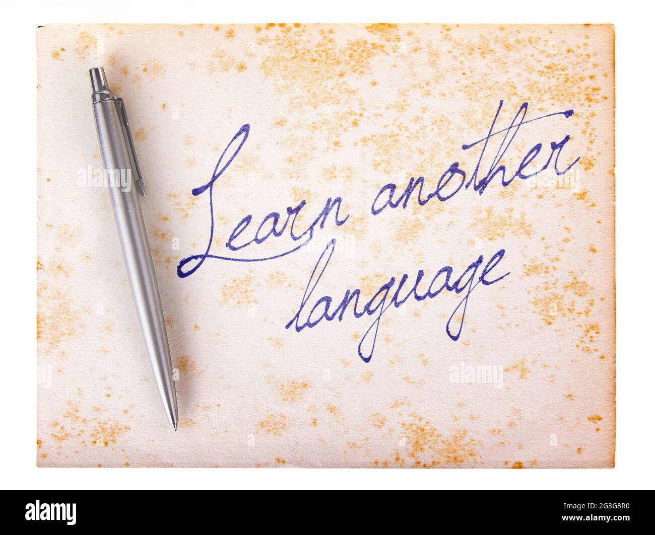 Old paper grunge background - Learn another language Stock Photo - Alamy