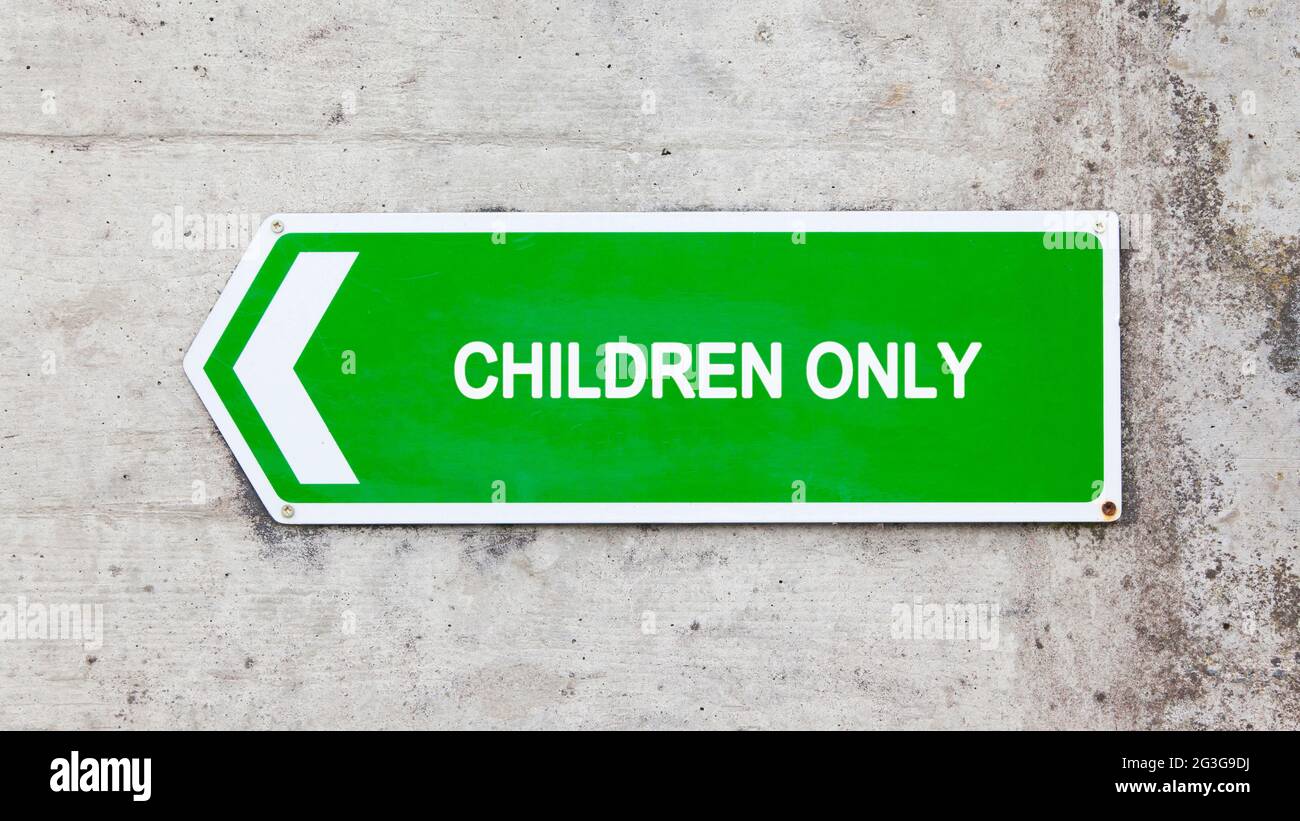 Green sign - Children only Stock Photo - Alamy