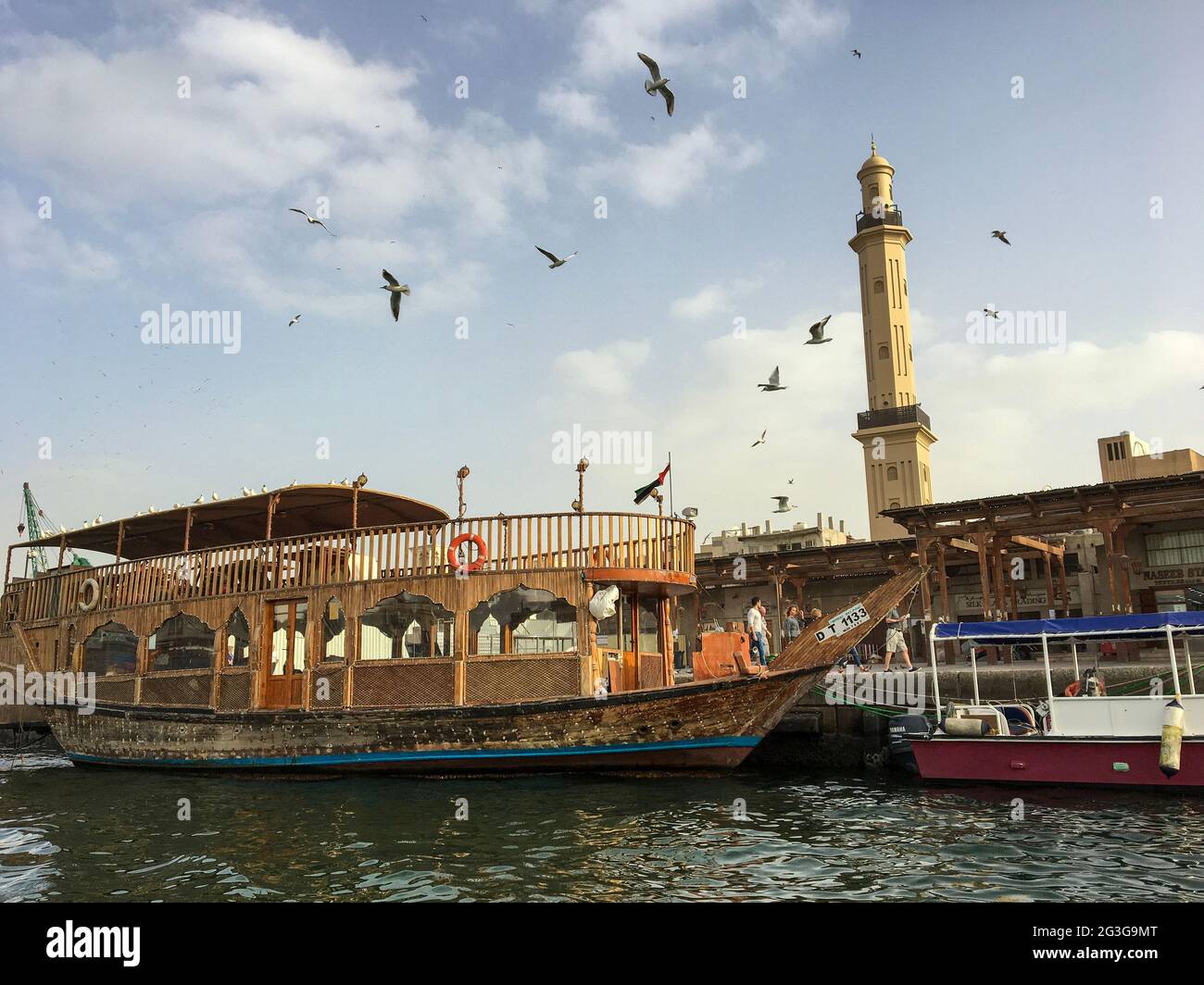 Low angle view of traditional wooden Abra boats in Dubai creek Area ...