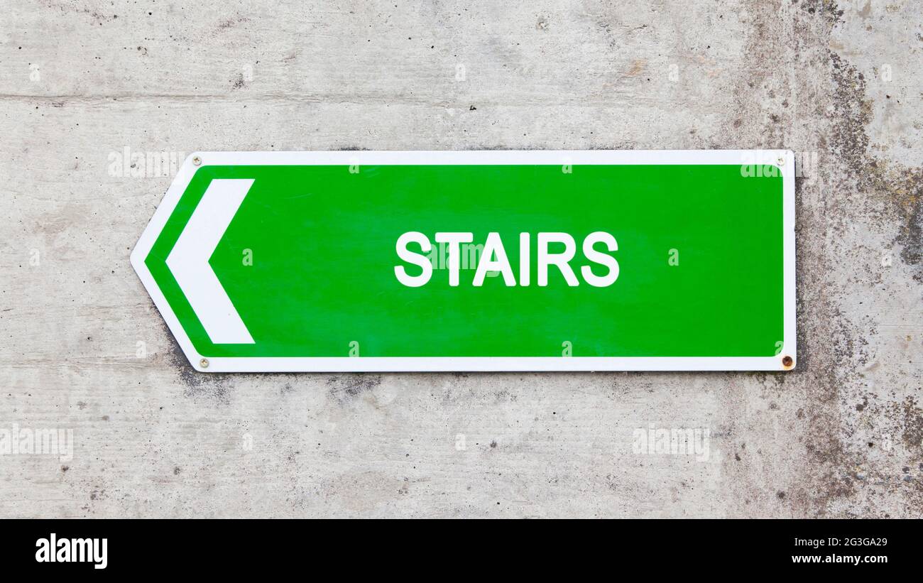 Green sign - Stairs Stock Photo - Alamy