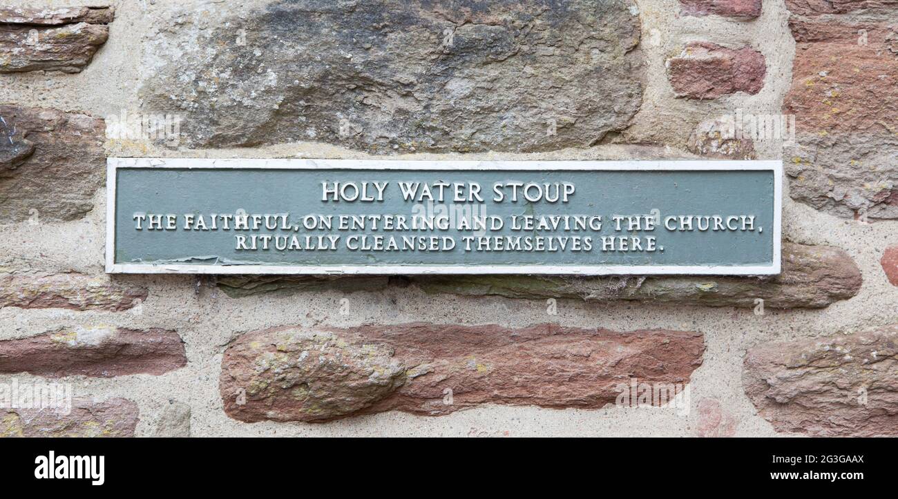Sign at a holy water stoup Stock Photo - Alamy