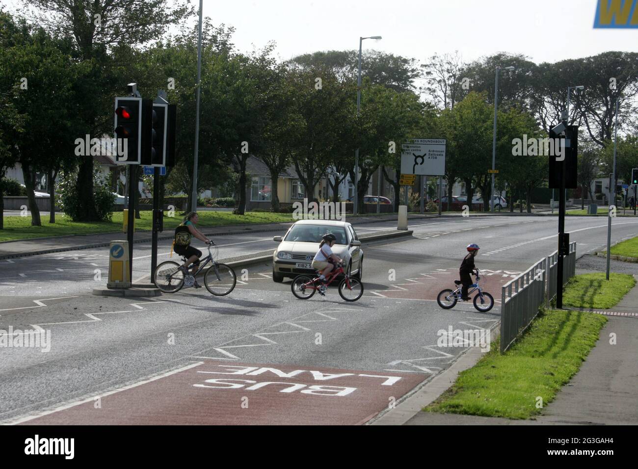 A78 Stevenston, North Ayrshire, Scotland. UK Children on bicycles ...
