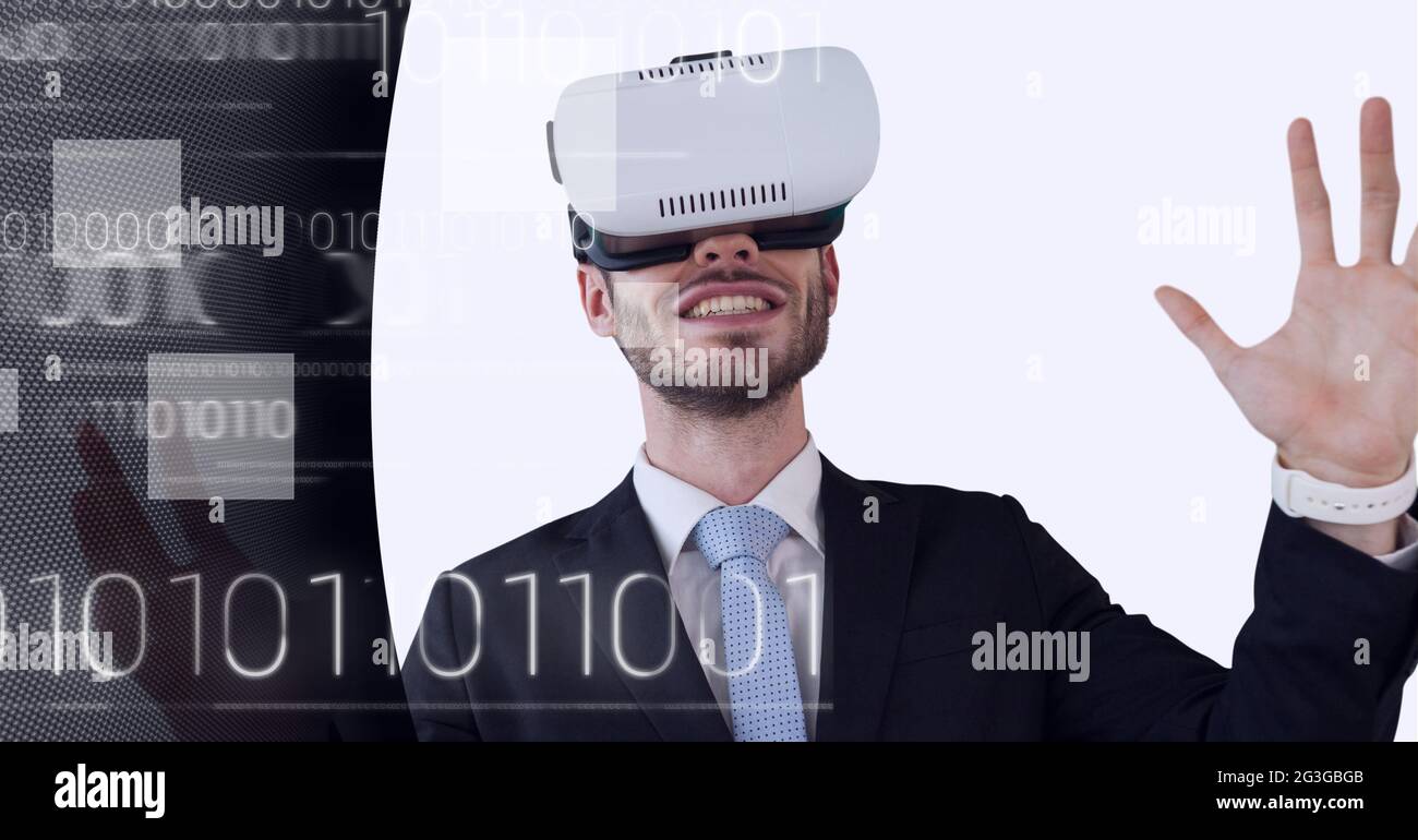 Binary coding data processing over businessman wearing vr headset ...
