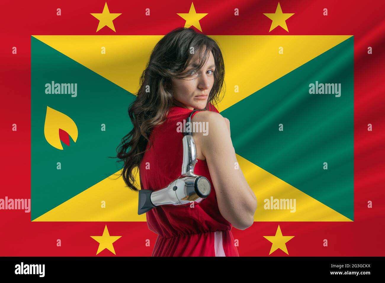 Beauty industry in Grenada. Happy female hairdresser holding hairdryer ...