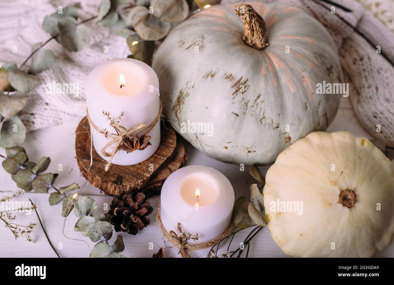 Autumn composition with pumpkin and candles. Beautiful autumn decor ...