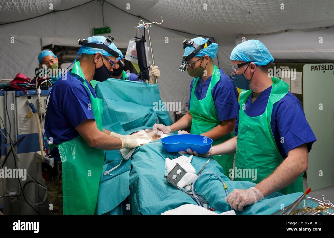 Surgeons in the operating theatre during a test of the Army Medical ...