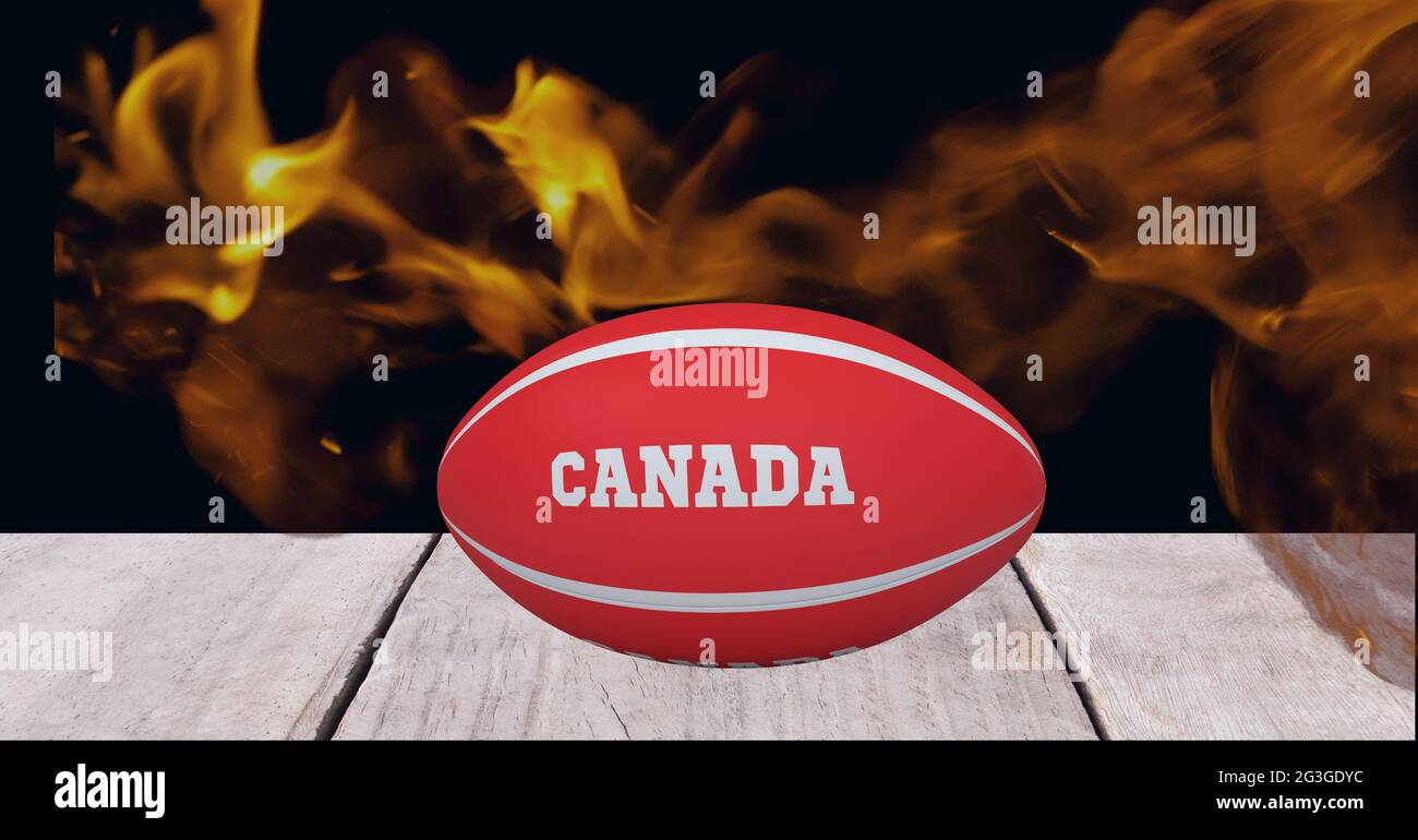 Red rugby ball with argentina text over wooden surface against fire ...