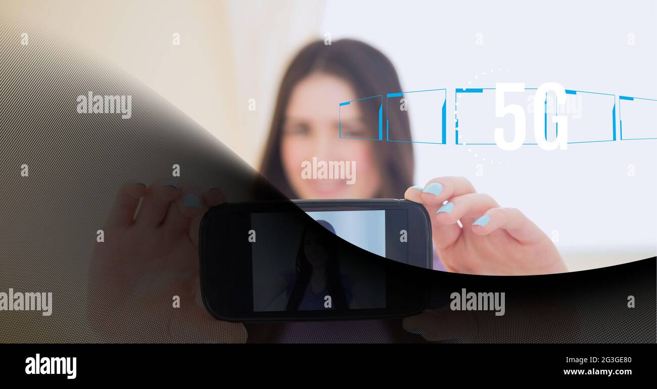 5g text over caucasian woman taking a selfie from smartphone against ...