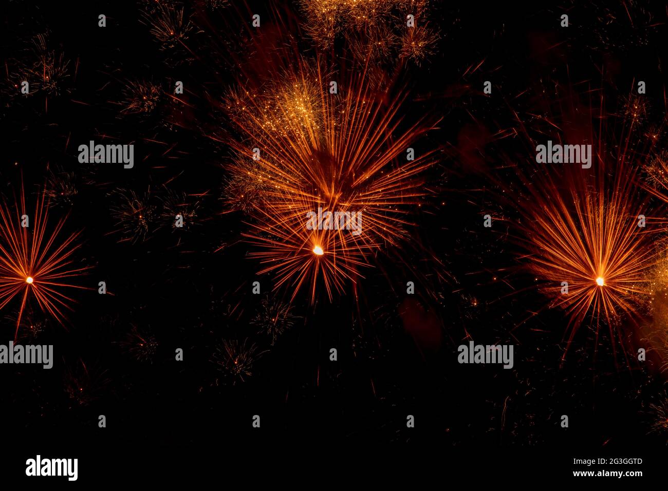 Orange fireworks isolated in the black night sky Stock Photo - Alamy