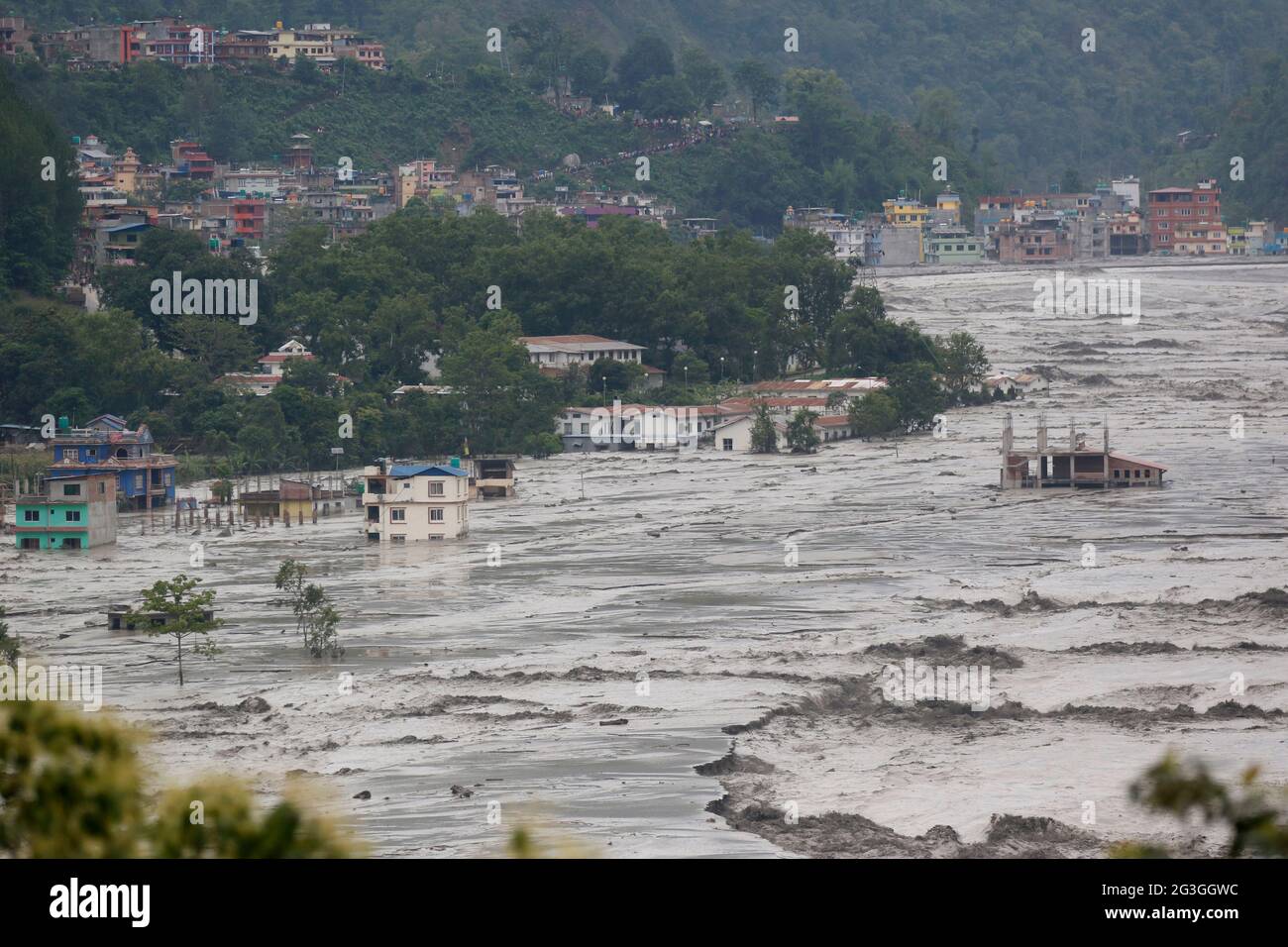 Sindhupalchowk, Nepal. 16th June, 2021. A general view shows houses hit ...