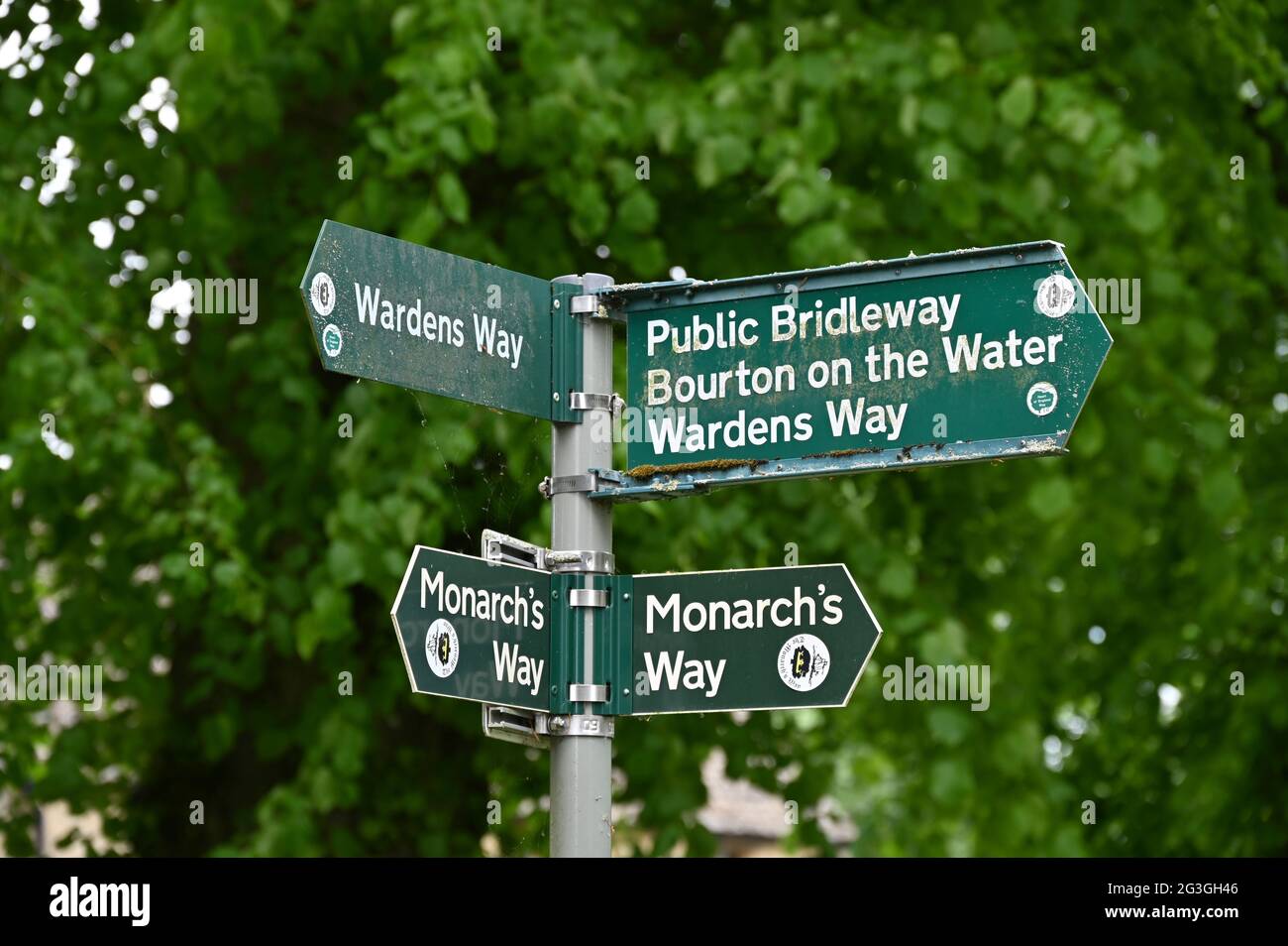 Signpost in the Cotswold village of Lower Slaughter point the way to ...