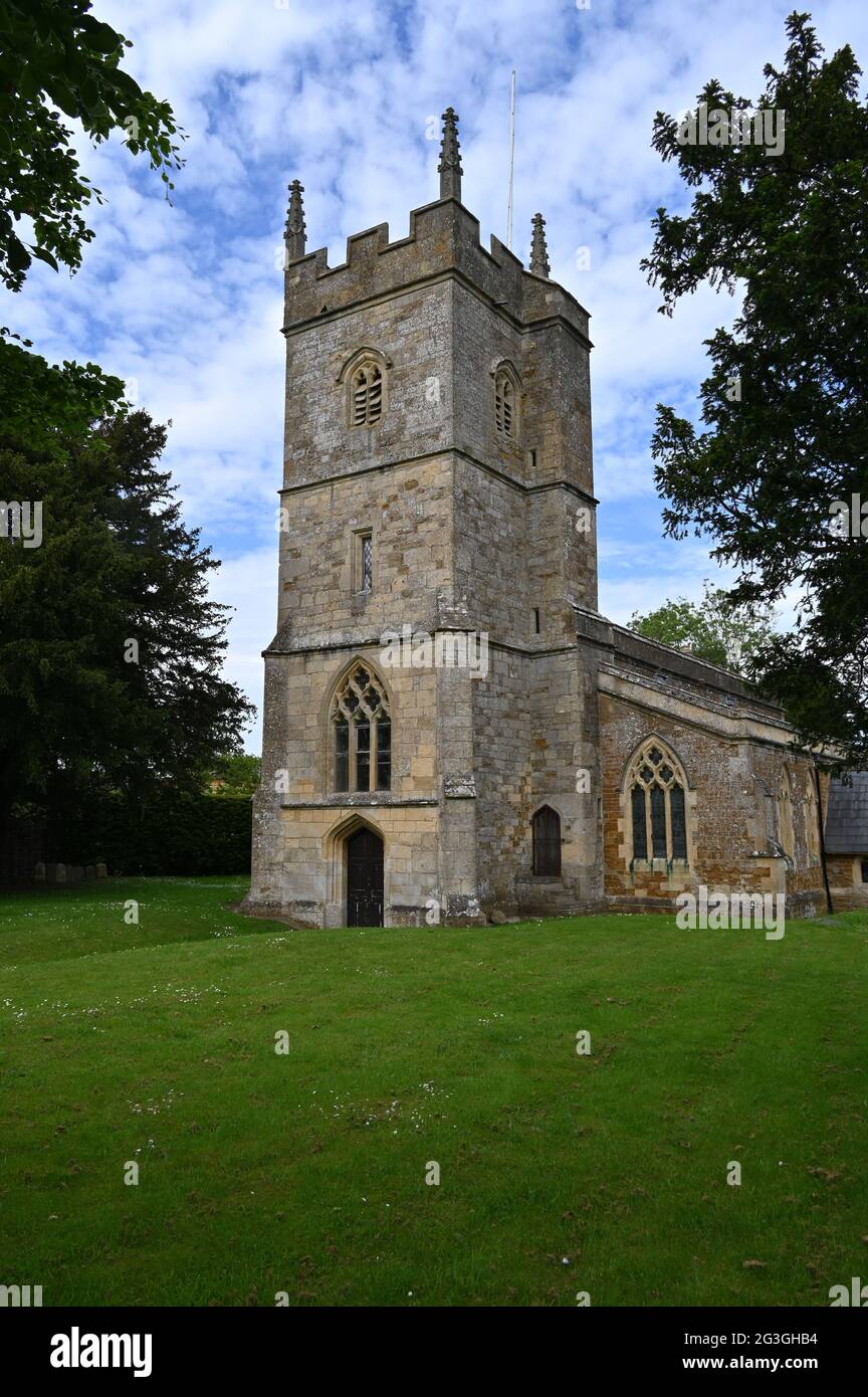 St Andrew's Church in the north Oxfordshire village of Kingham Stock ...