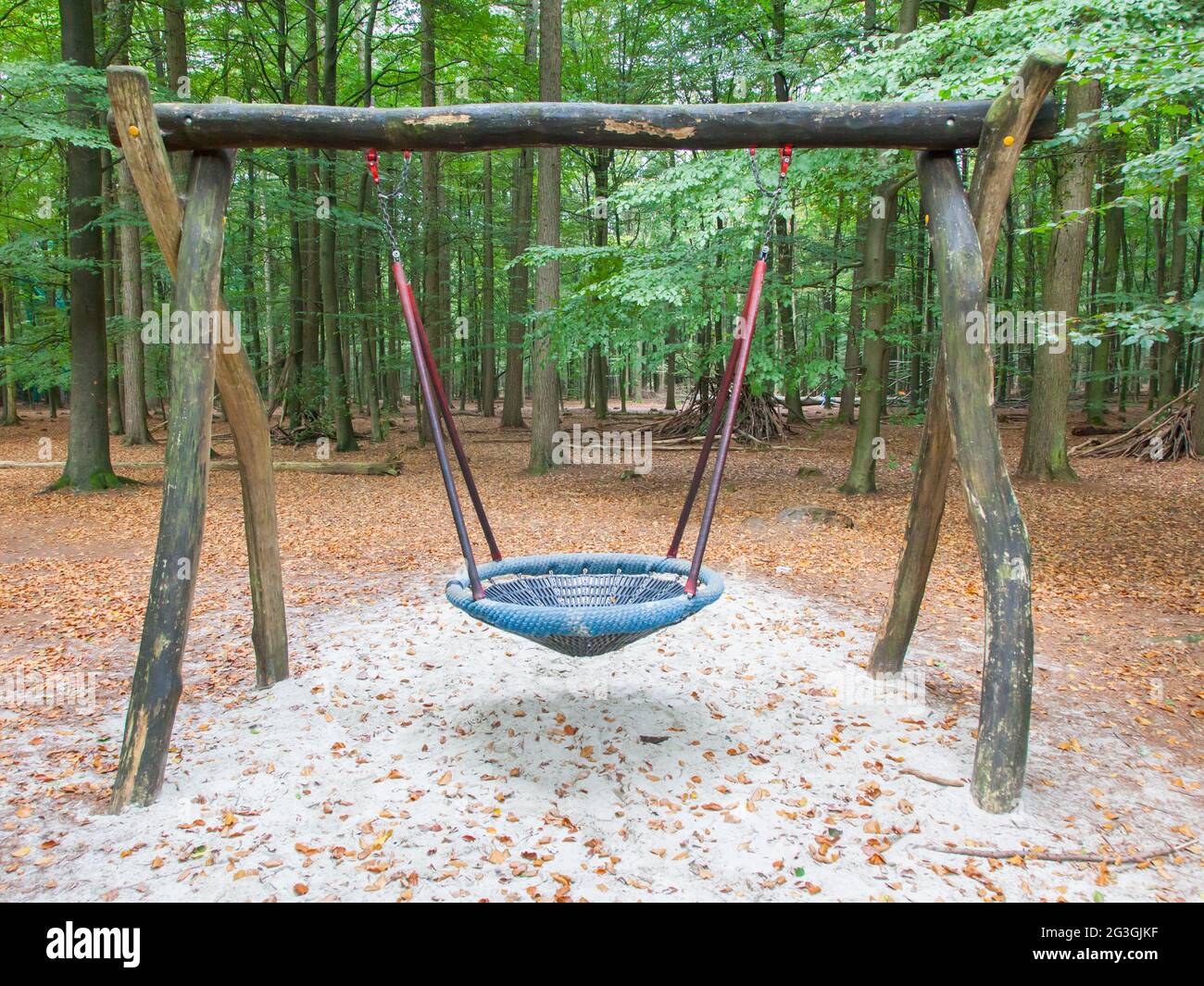 Swing in a park Stock Photo - Alamy