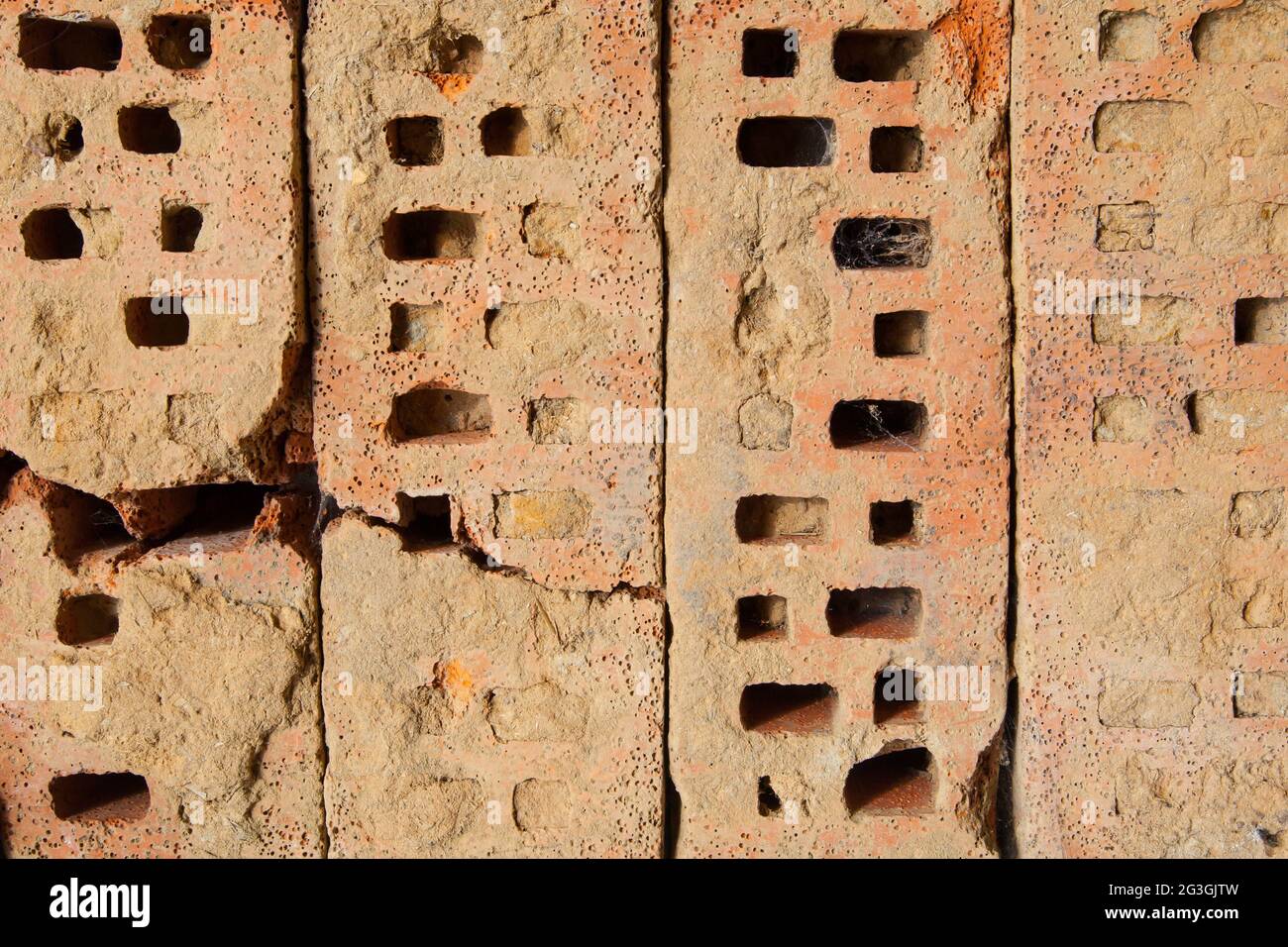 Four old bricks on a row Stock Photo - Alamy