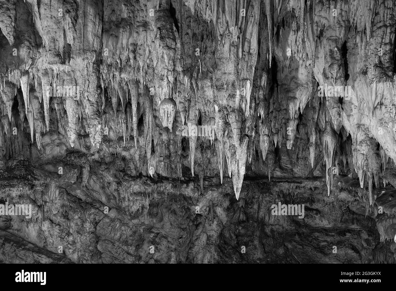 Beautiful stalagmites stalactite inside Black and White Stock Photos ...