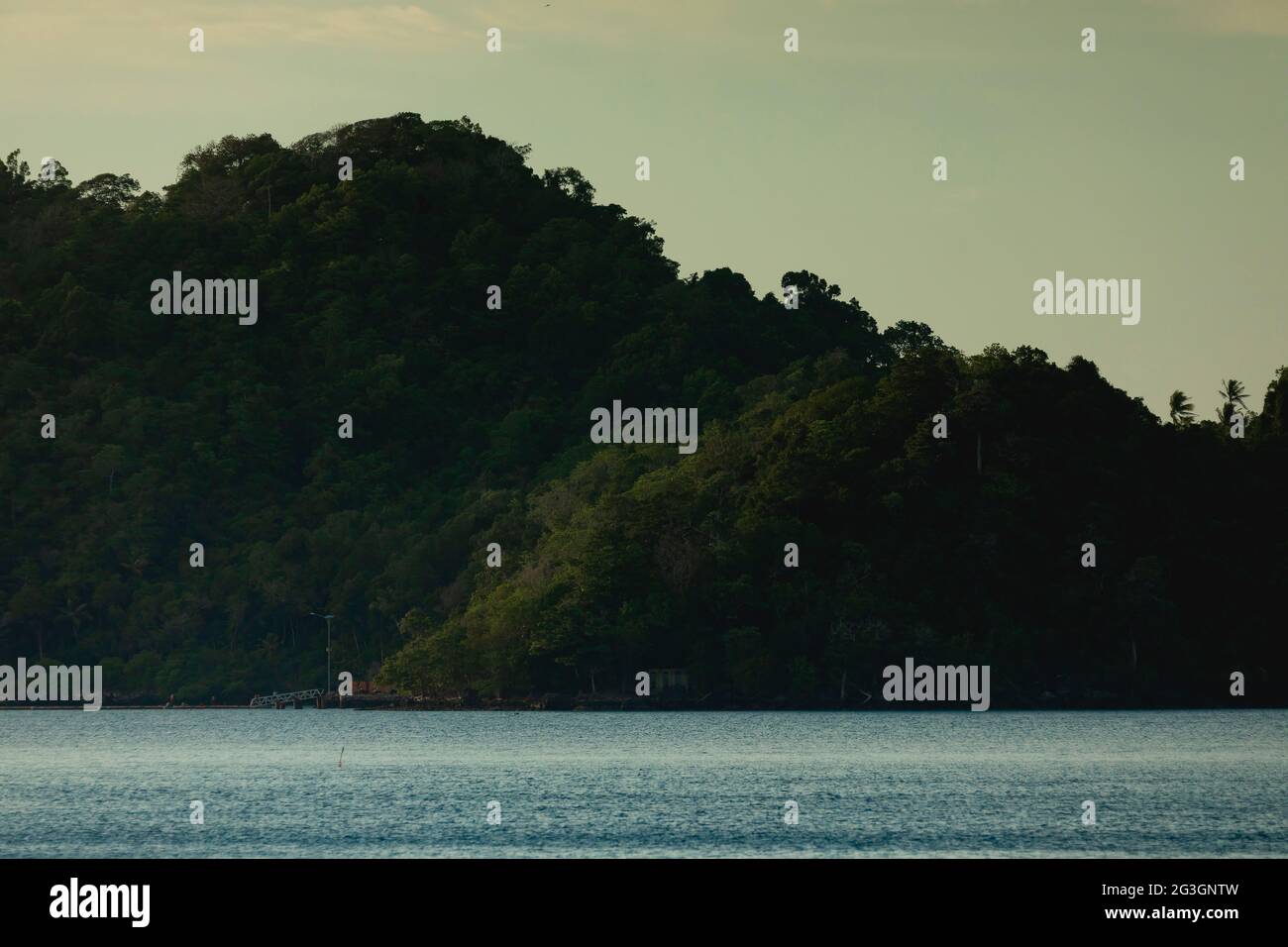Seascape and jungle at sunset, Pulau Seulako Island from Iboih Beach ...