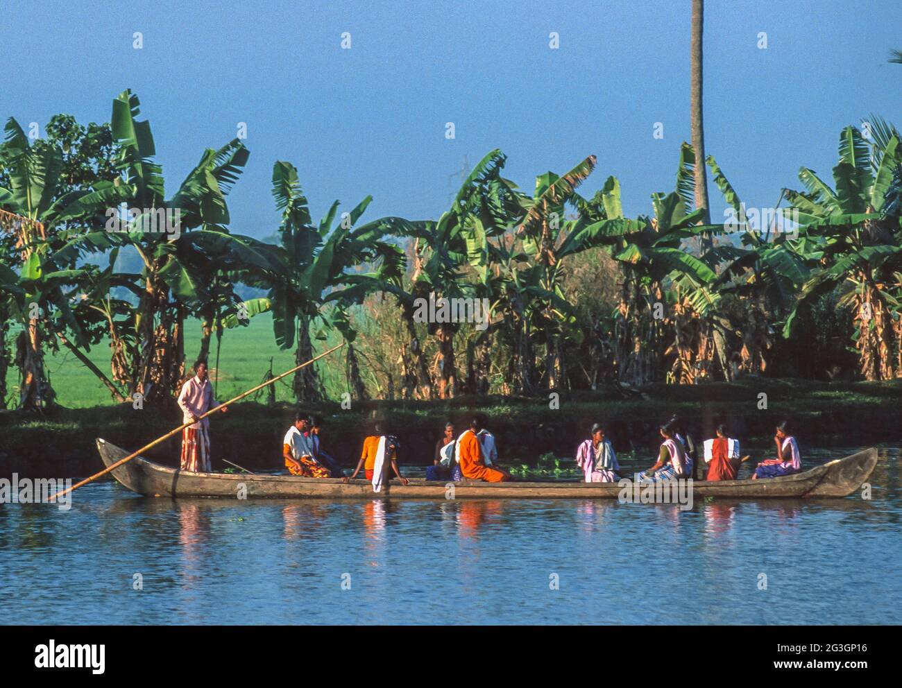 KERALA, INDIA - Small ferry boat canoe carries women passengers on ...
