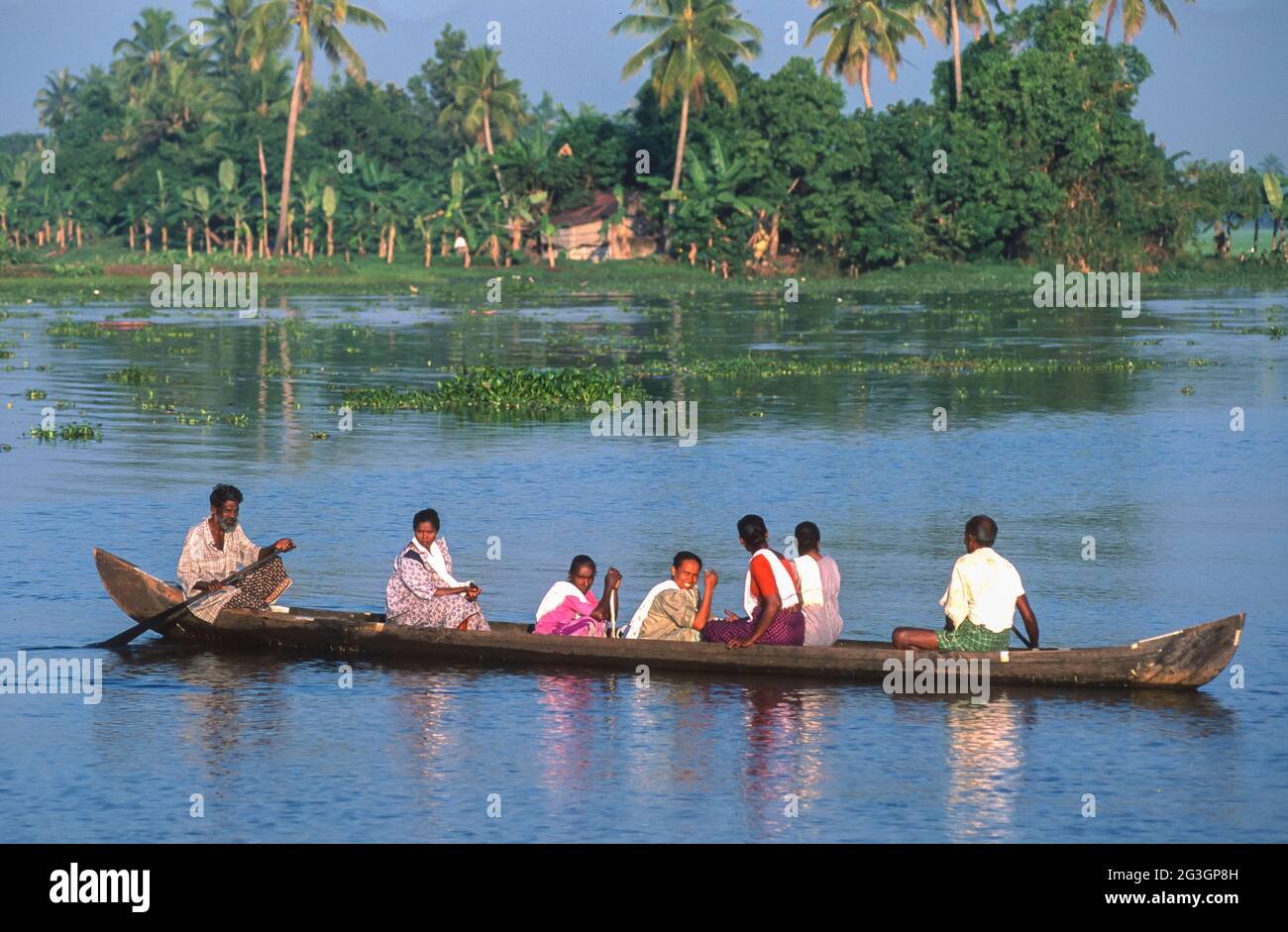 KERALA, INDIA - People in small boat on Backwaters canal Stock Photo ...