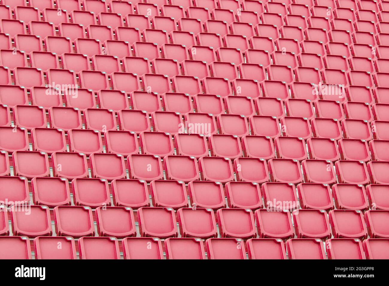 Red seat in sport stadium Stock Photo - Alamy