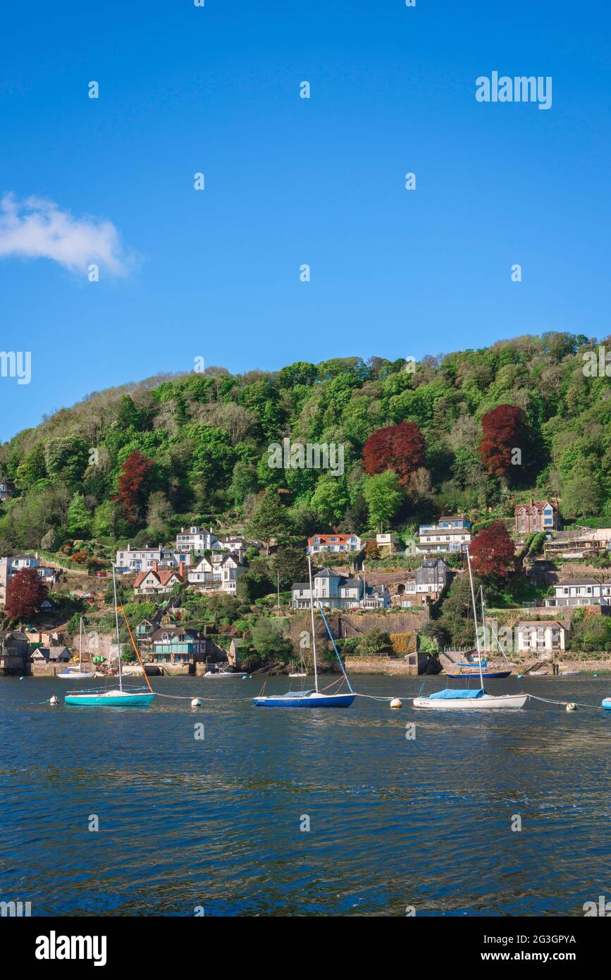 River Dart, view in summer of boats moored in the River Dart Valley ...