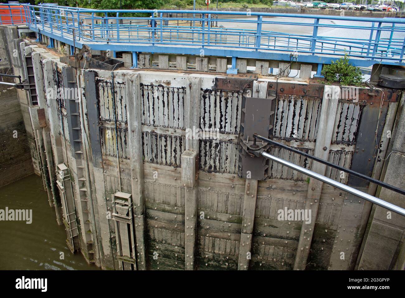 Dock entrance gate ready to open Stock Photo - Alamy