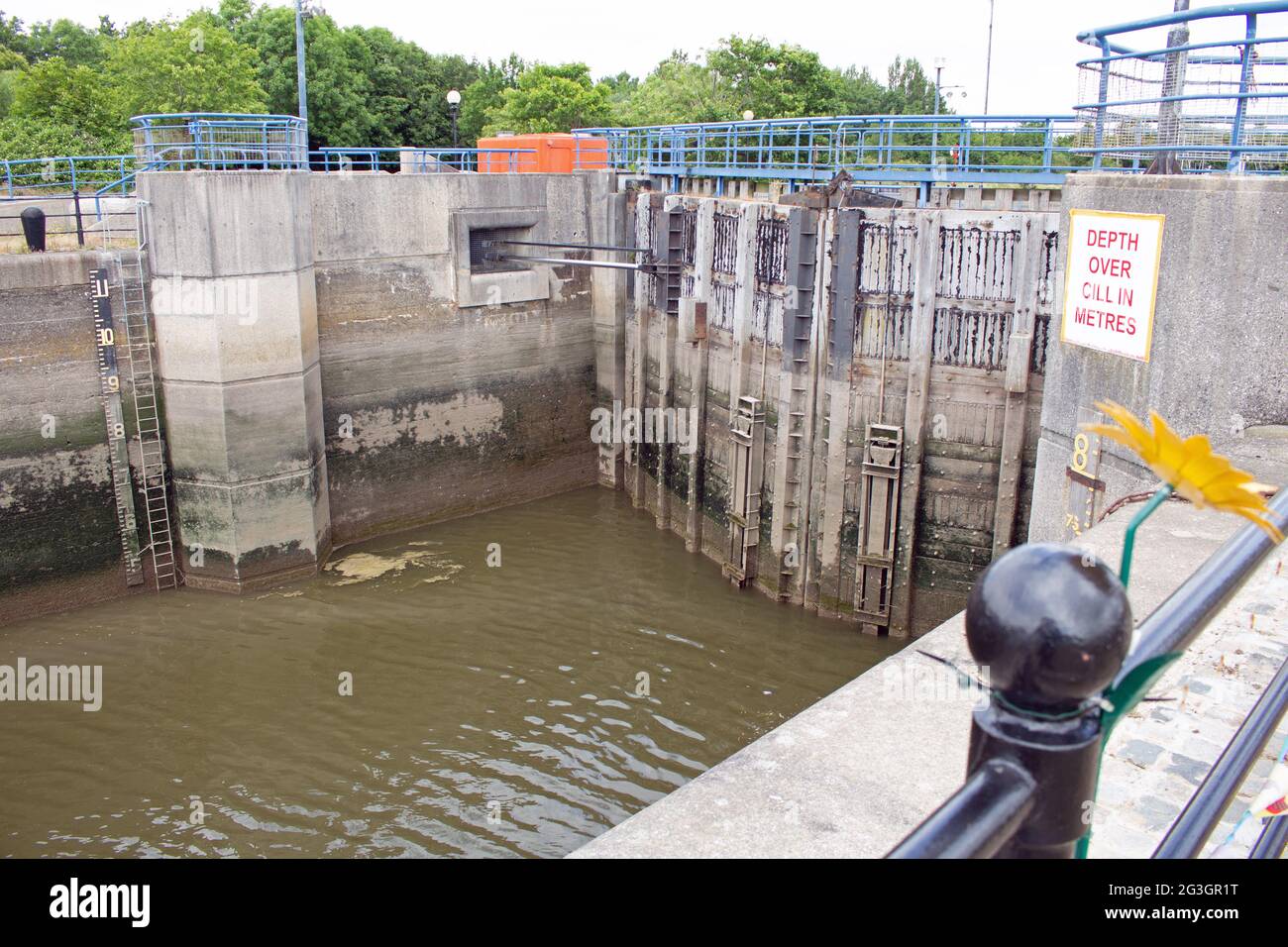 Dock entrance gate ready to open Stock Photo - Alamy