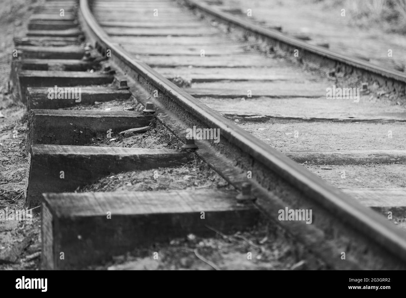 Grayscale shot of railroad tracks Stock Photo - Alamy