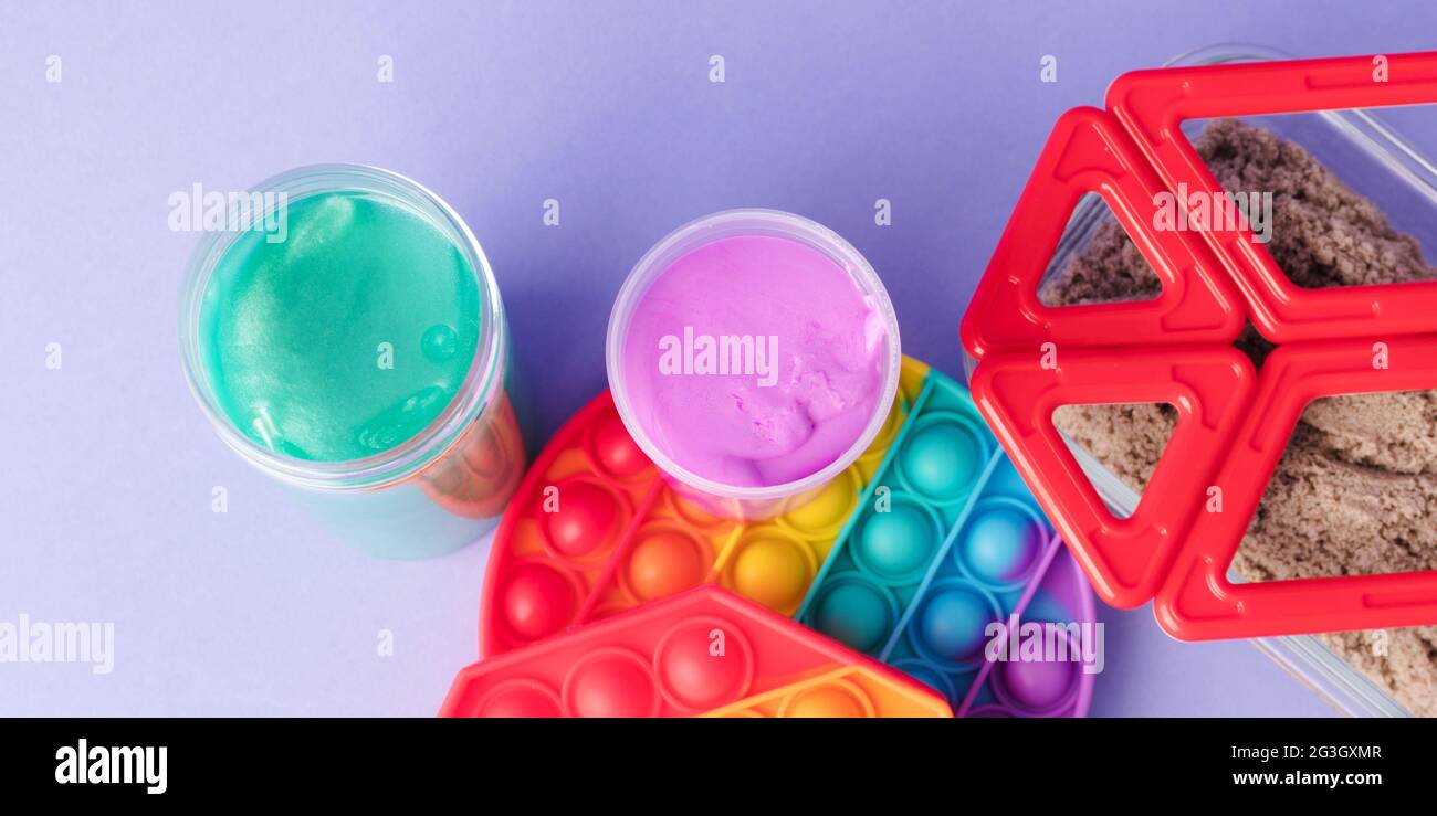 Set of colorful fidget toys to help reduce stress and anxiety in kids ...