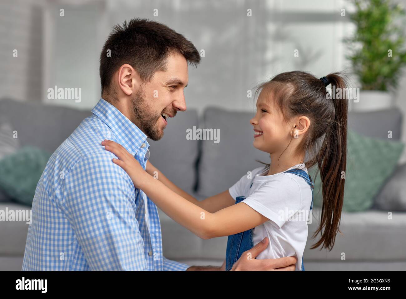 father hugging his cute little child daughter Stock Photo - Alamy