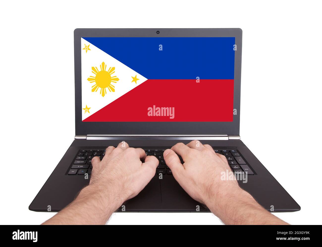 Hands working on laptop, Philippines Stock Photo - Alamy