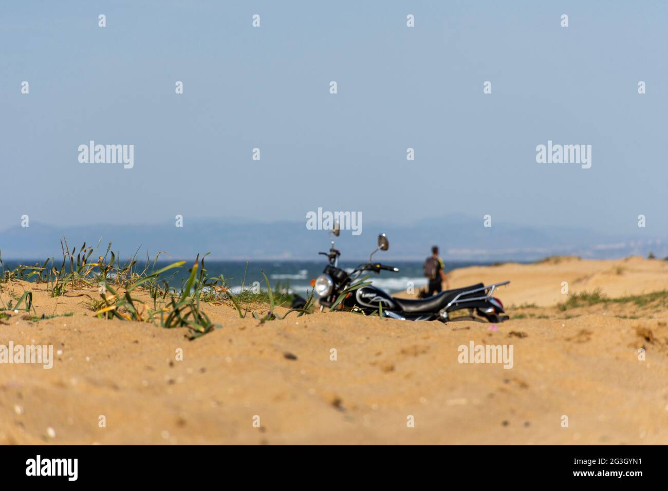 Motorcycle on beach blue sky hi-res stock photography and images - Alamy