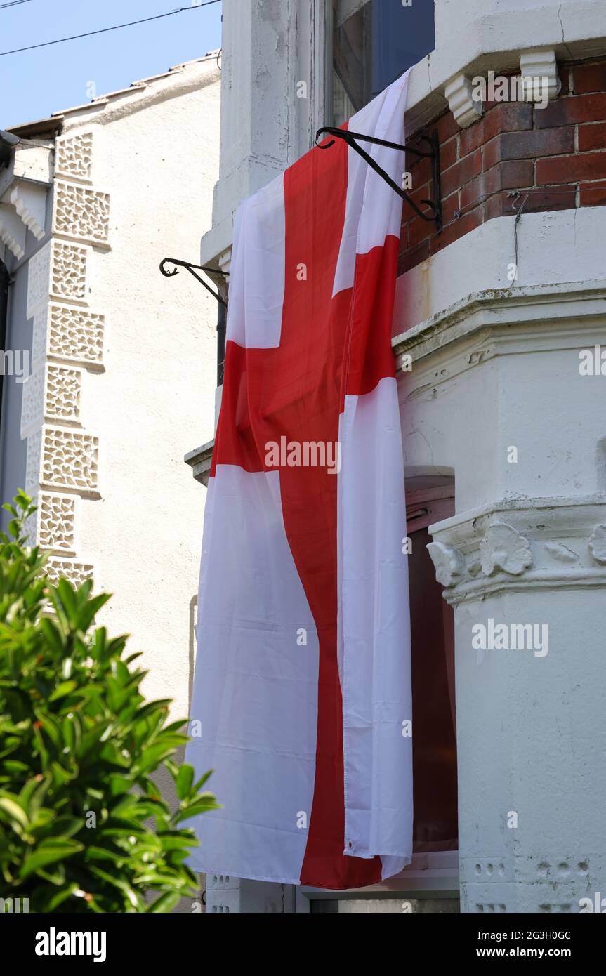 English football flags seen hanging out of windows in the UK Stock ...