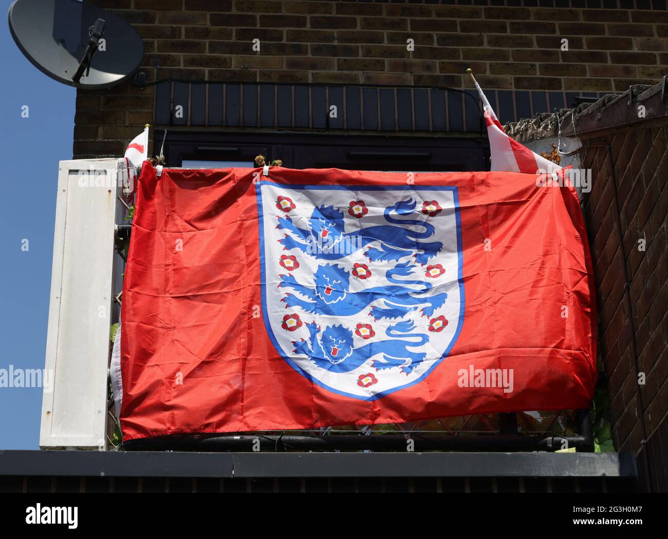 English football flags seen hanging out of windows in the UK Stock ...