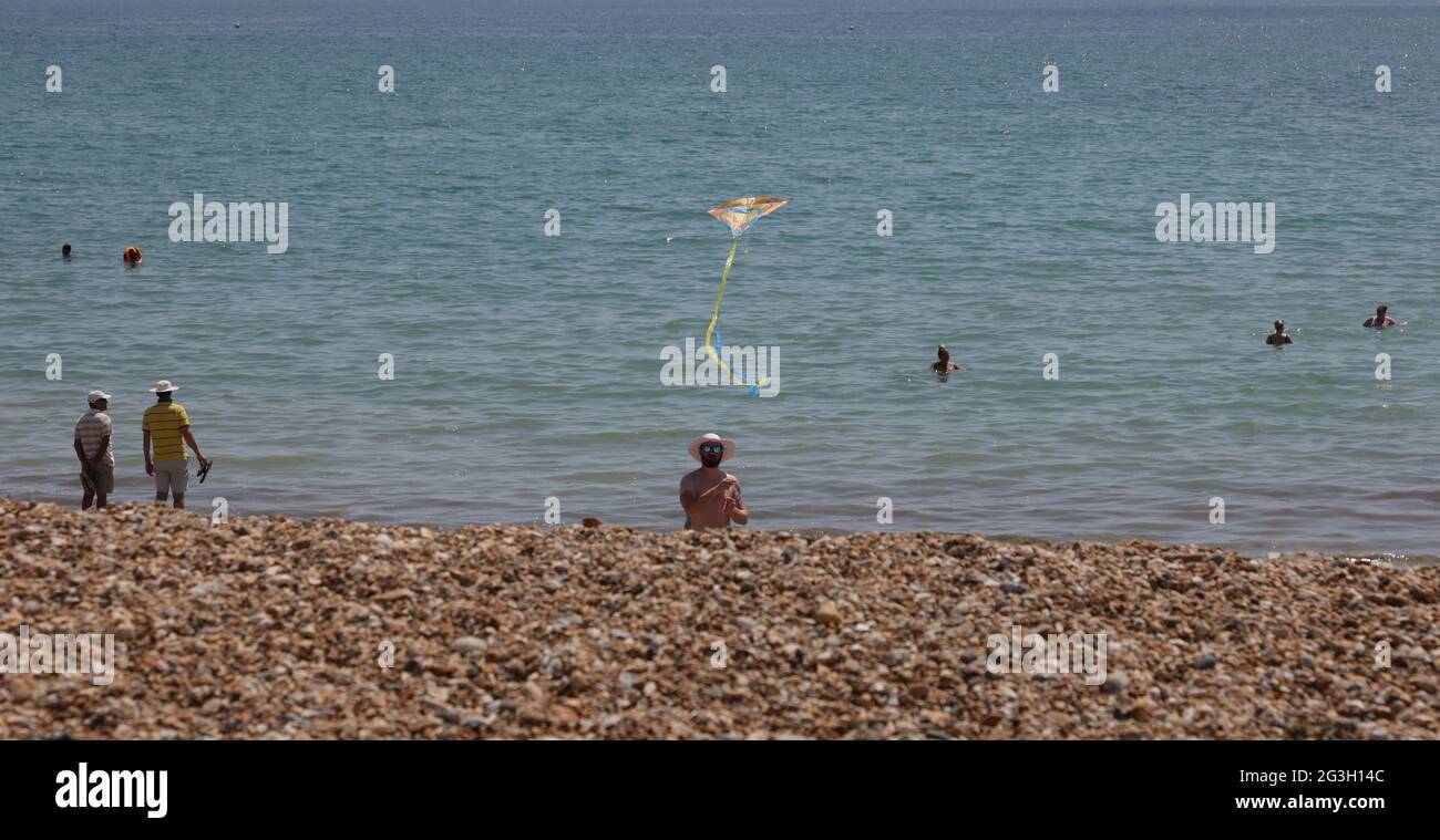 People seen on the beach of Bognor Regis, during a warm and sunny day ...