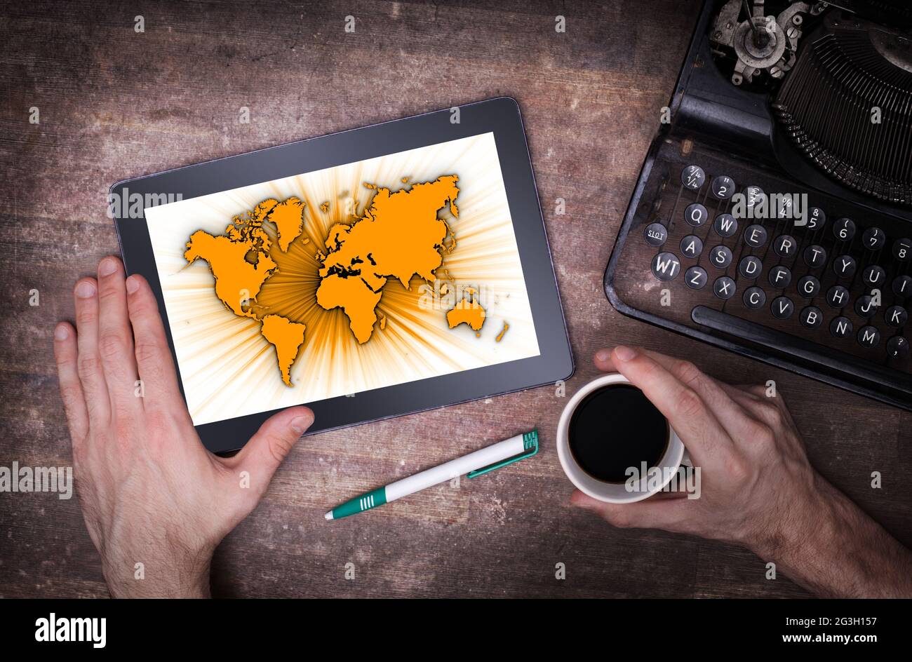 World map on a tablet Stock Photo - Alamy