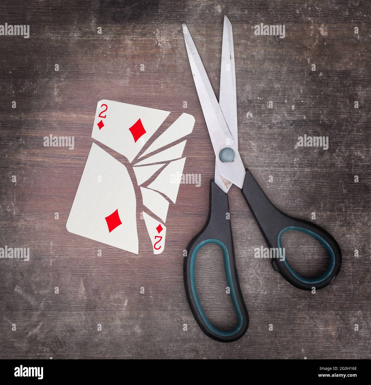 Concept of addiction, card with scissors Stock Photo - Alamy