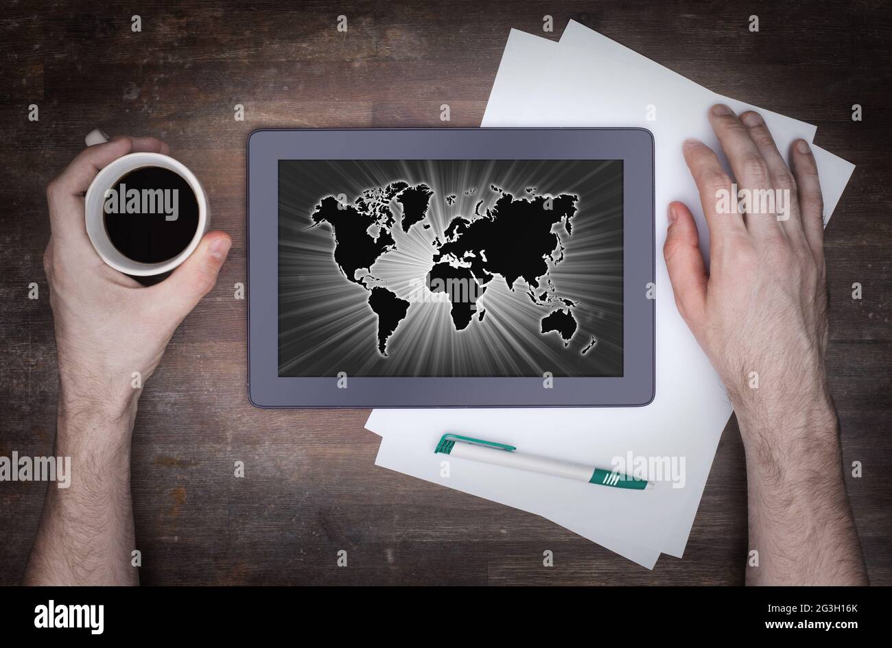 World map on a tablet Stock Photo - Alamy