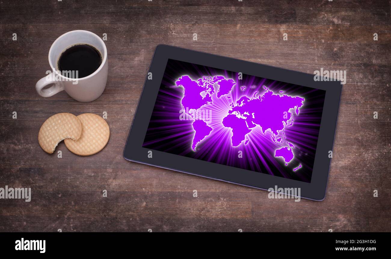 World map on a tablet Stock Photo - Alamy