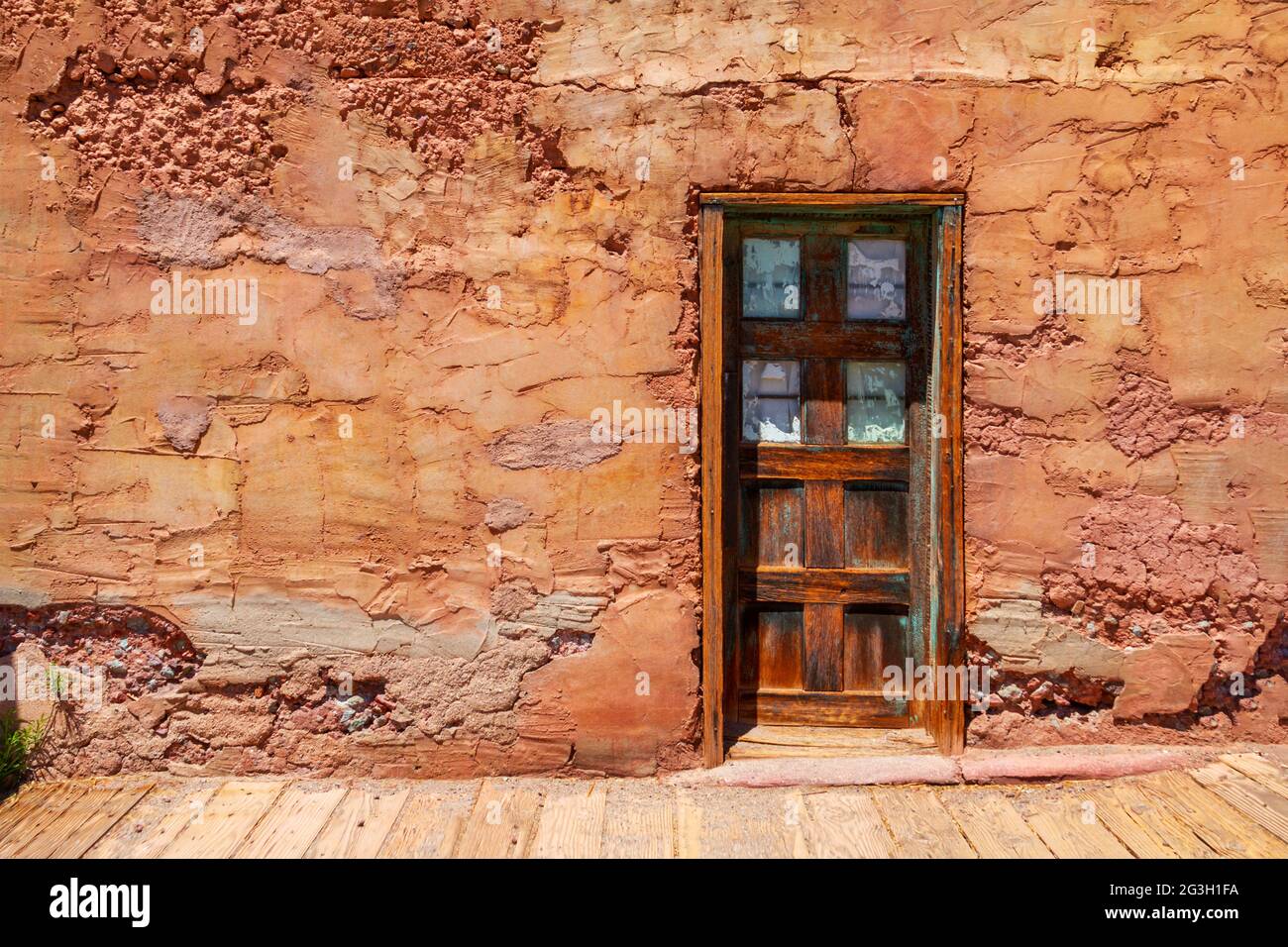 Old western rustic style door and wall with wooden floor Stock Photo ...