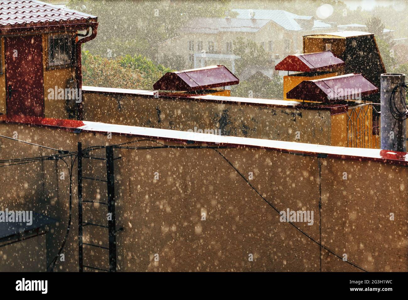 Heavy rain falling on house hi-res stock photography and images - Alamy