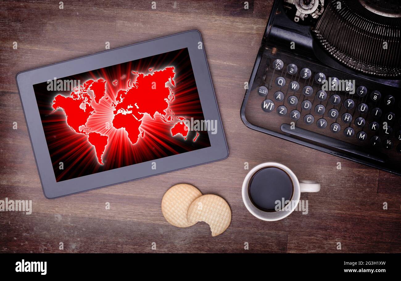 World map on a tablet Stock Photo - Alamy