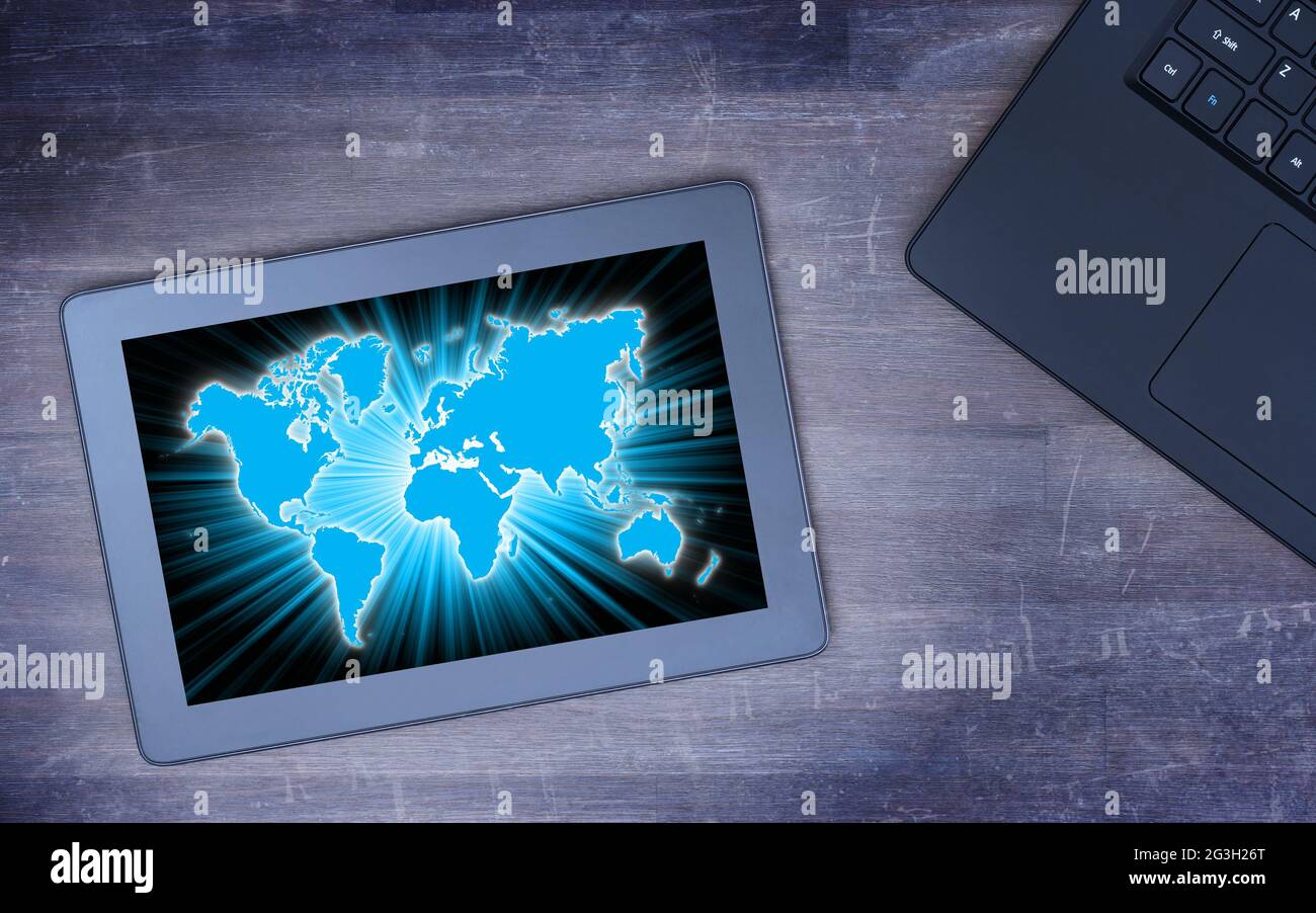 World map on a tablet Stock Photo - Alamy