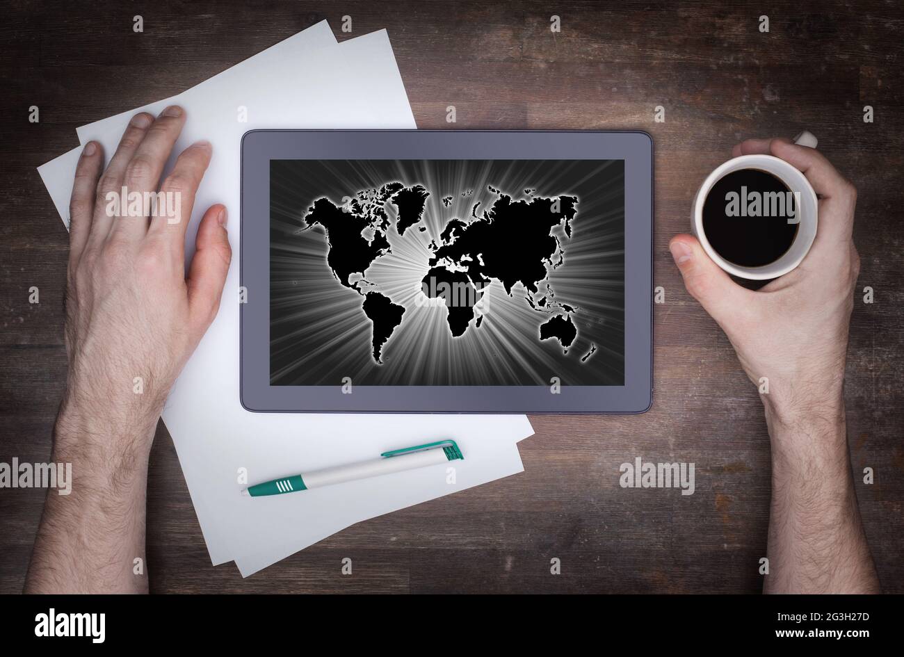 World map on a tablet Stock Photo - Alamy