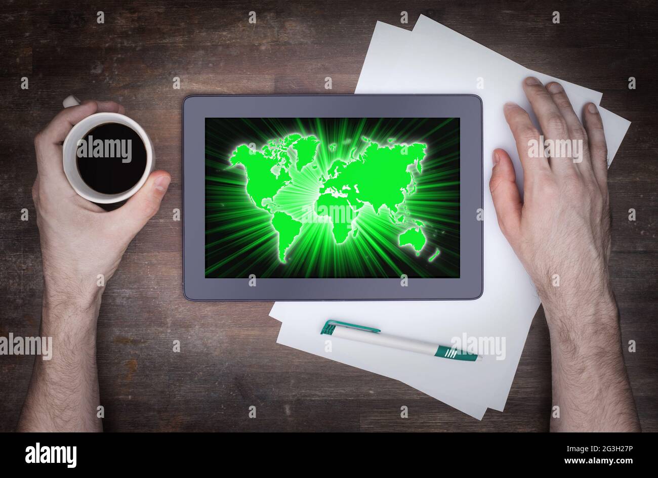 World map on a tablet Stock Photo - Alamy